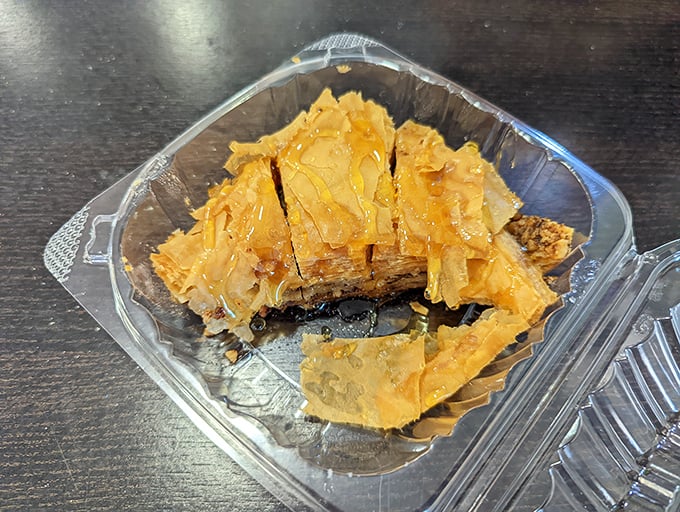 Flaky, honey-sweet baklava that shatters with each bite—a surprising Mediterranean finale to your cheesesteak adventure.