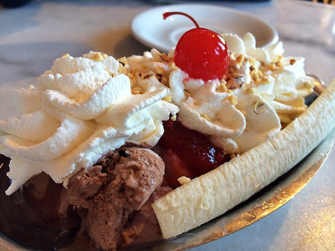 The banana split that launched a thousand diets—and was worth every calorie. That cherry on top isn't just garnish, it's a victory flag.