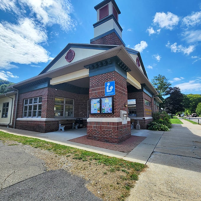 The Barbara M. Brown Memorial Library isn't just about books—it's a community living room where stories and friendships unfold beneath that charming cupola.