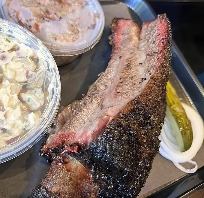 This isn't just brisket—it's a smoke-kissed masterpiece with a bark so perfect it deserves its own appreciation society.