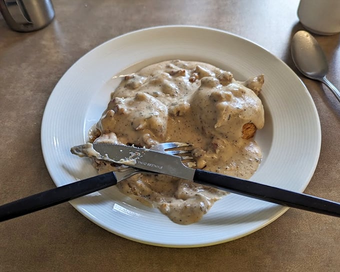 Biscuits and gravy so authentic they deserve their own country song. The pepper specks aren't decoration—they're promises.