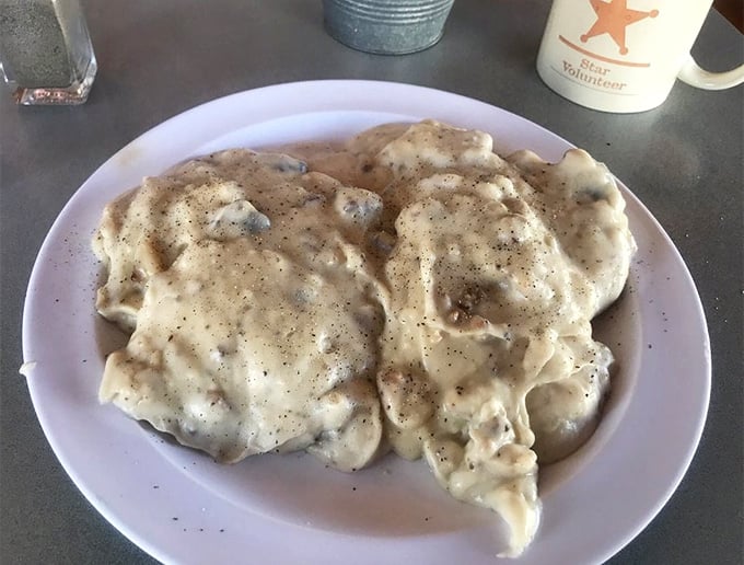 Behold the holy grail of breakfast – biscuits and gravy so perfectly peppered and creamy, they've probably prevented several divorces over the years.