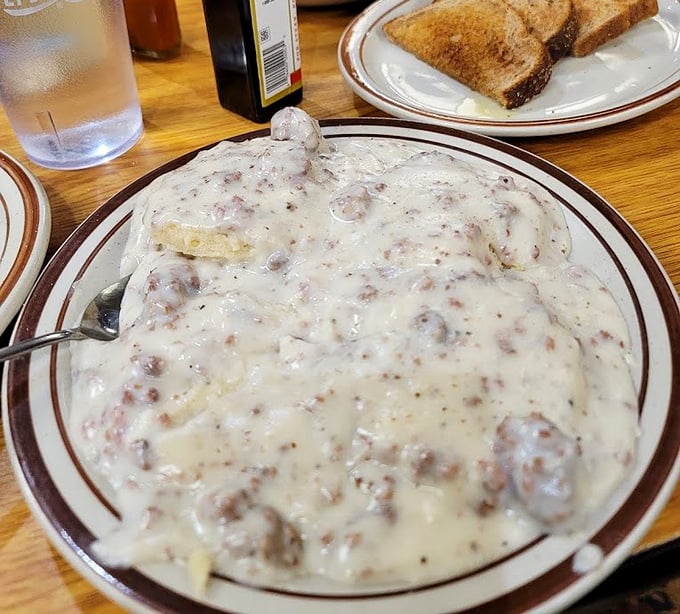 Behold the holy grail of comfort food—biscuits and gravy so rich and creamy, you'll want to bathe in it.