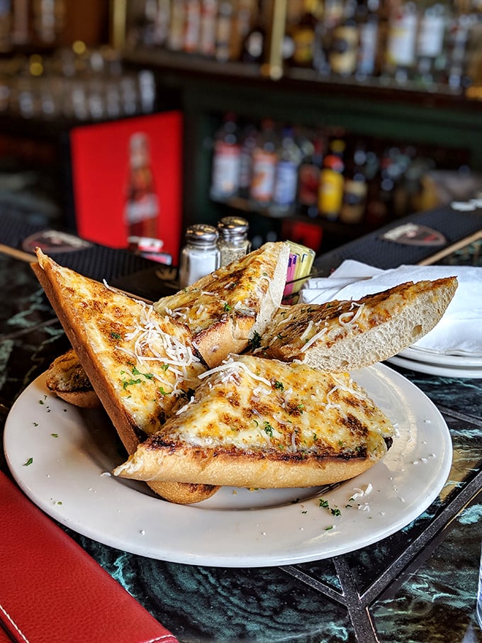Behold the legendary Blarney Bread – golden, garlicky, and glorious. One bite of this cheesy baguette and you'll be spinning yarns like you kissed the stone itself.
