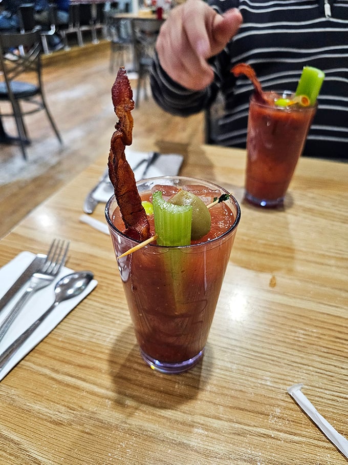 Not just any Bloody Mary – this is breakfast in a glass, complete with a crispy bacon sentinel standing guard over celery and olives.