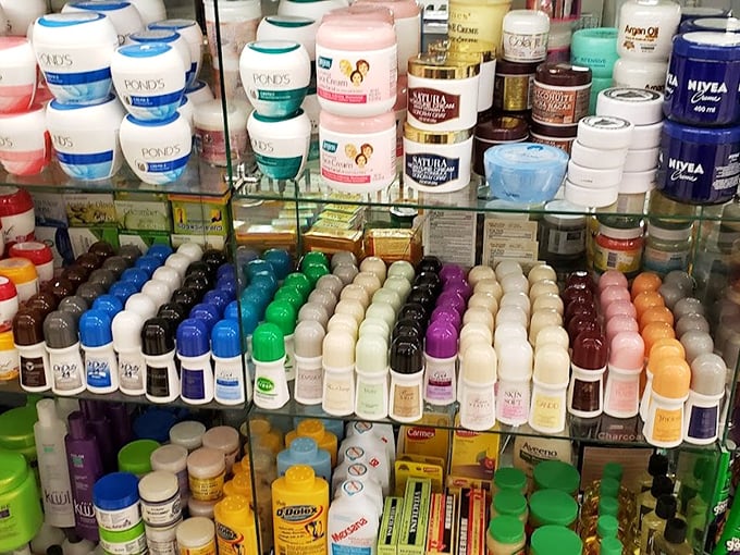 Beauty products arranged with military precision, a rainbow arsenal against aging. The cosmetic equivalent of "one-stop shopping" before that phrase became corporate.