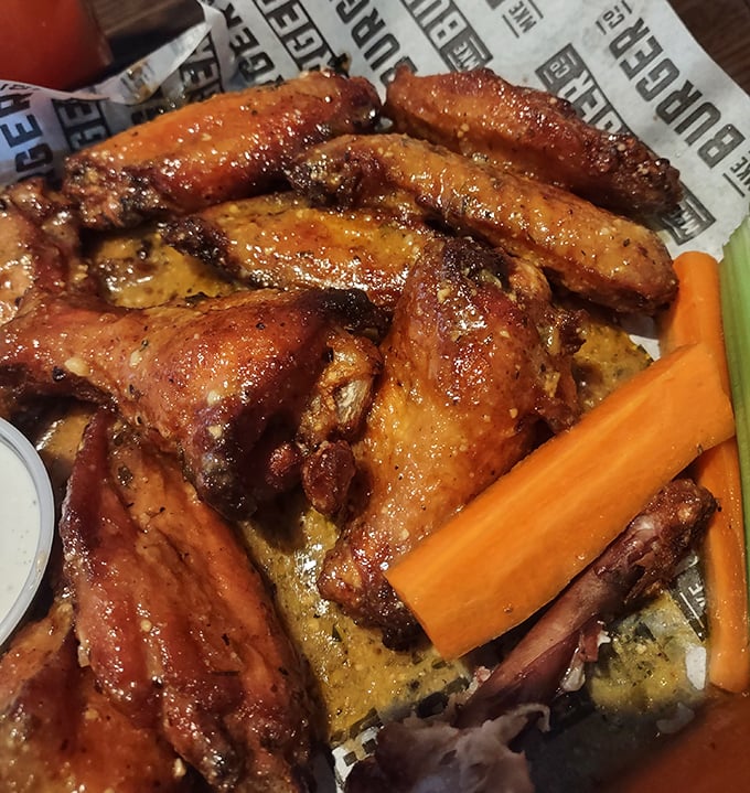 These wings aren't just cooked—they're transformed into glistening, sauce-lacquered masterpieces that demand to be devoured with reckless abandon.