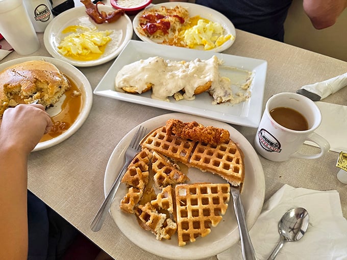 Breakfast nirvana on full display – golden waffles, biscuits smothered in gravy, and eggs that remind you why breakfast deserves its legendary status.