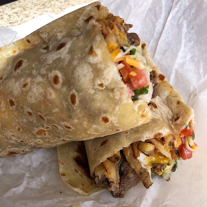 Behold the architectural marvel that is a proper California burrito—where tortilla engineering meets culinary artistry in perfect harmony.