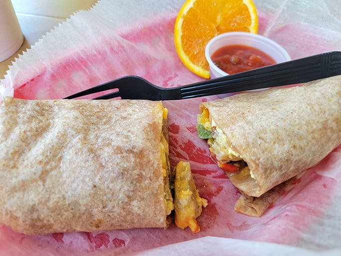 The legendary breakfast burrito in all its glory—where eggs, cheese, and veggies unite in a tortilla embrace so perfect it should have its own Florida heritage site designation.