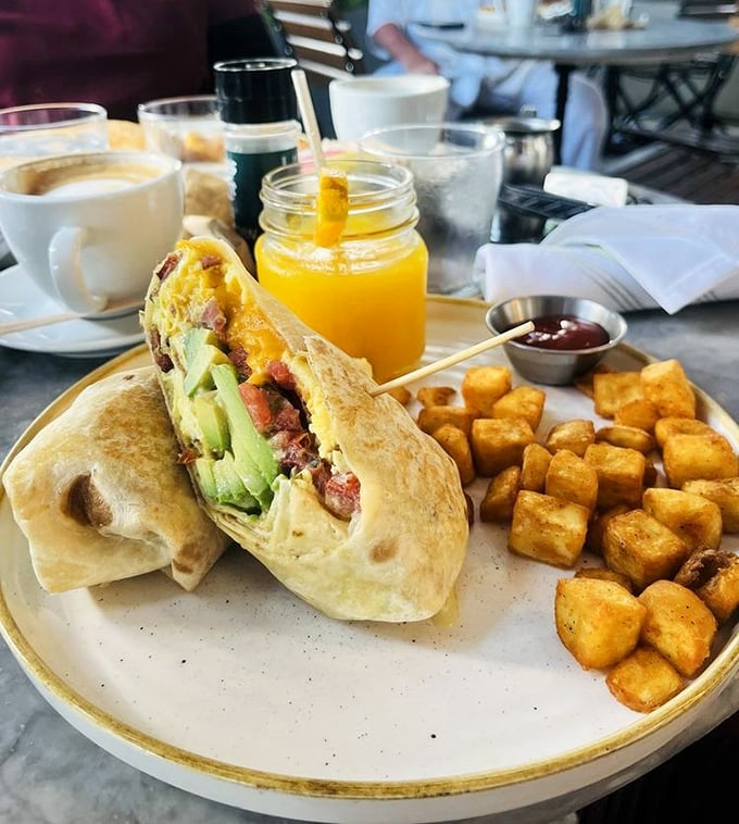 This breakfast burrito doesn't just start your day—it launches it into the stratosphere with avocado, eggs, and home fries worthy of front-page news.