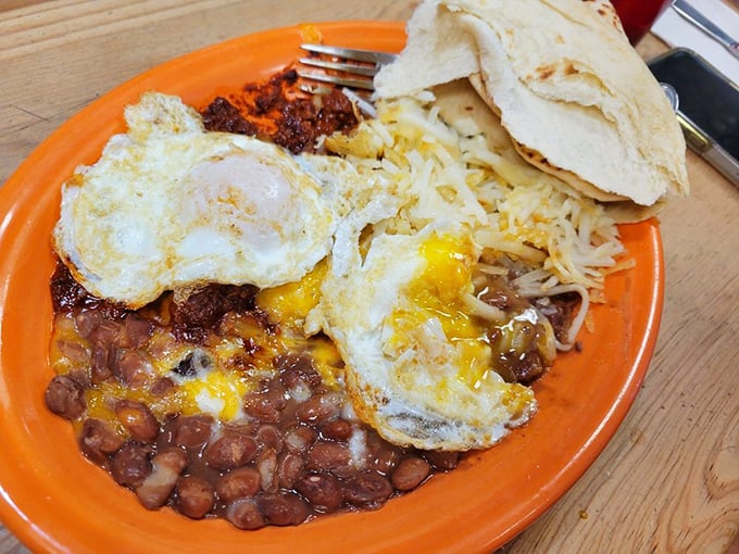 Breakfast plates here don't mess around—eggs, beans, chile, and tortillas form the perfect morning symphony together.