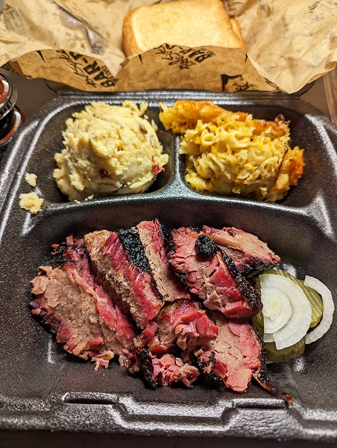 That pink smoke ring isn't makeup—it's the barbecue equivalent of a Rolex, signaling hours of patient smoking over real hickory wood. No shortcuts, just craftsmanship. 