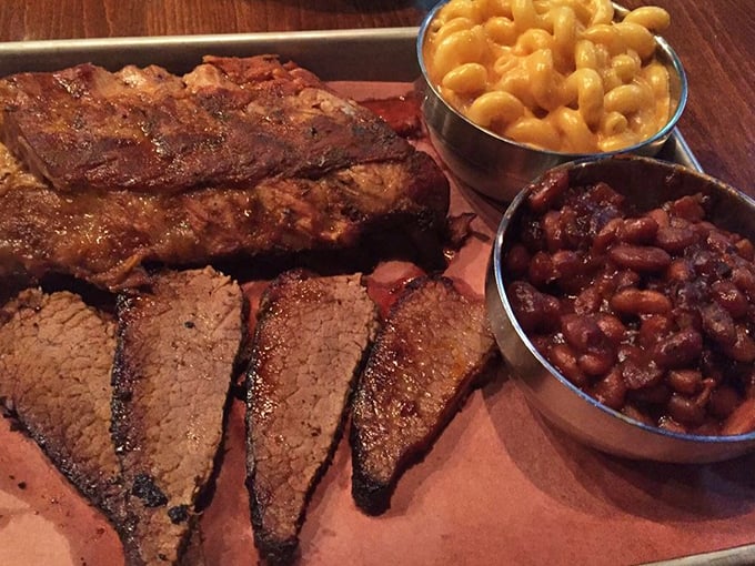 Behold the brisket in all its glory – that pink smoke ring isn't just decoration, it's a barbecue badge of honor earned through hours of patient smoking.