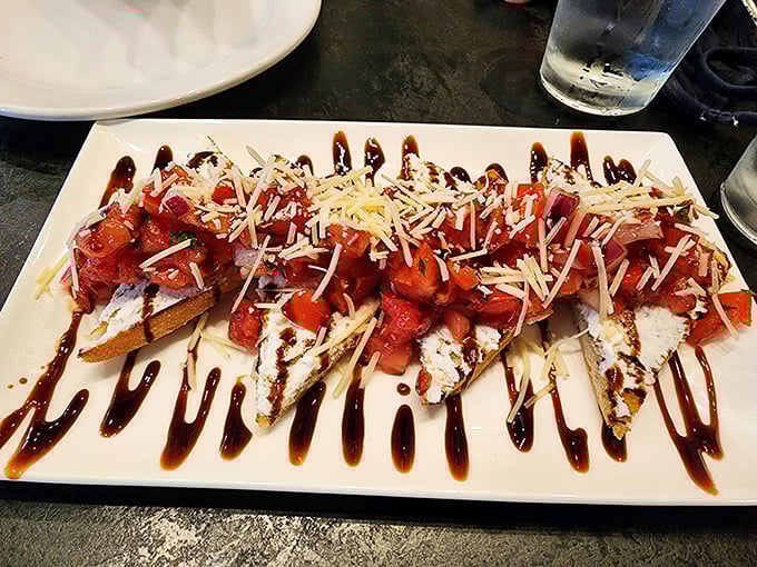 Bruschetta that makes other versions seem like distant, forgotten relatives. Those roasted tomatoes aren't just toppings—they're the main event.