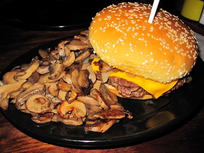 This isn't just a cheeseburger—it's a masterpiece of melted American cheese and sautéed mushrooms that makes you question why you'd eat anything else.