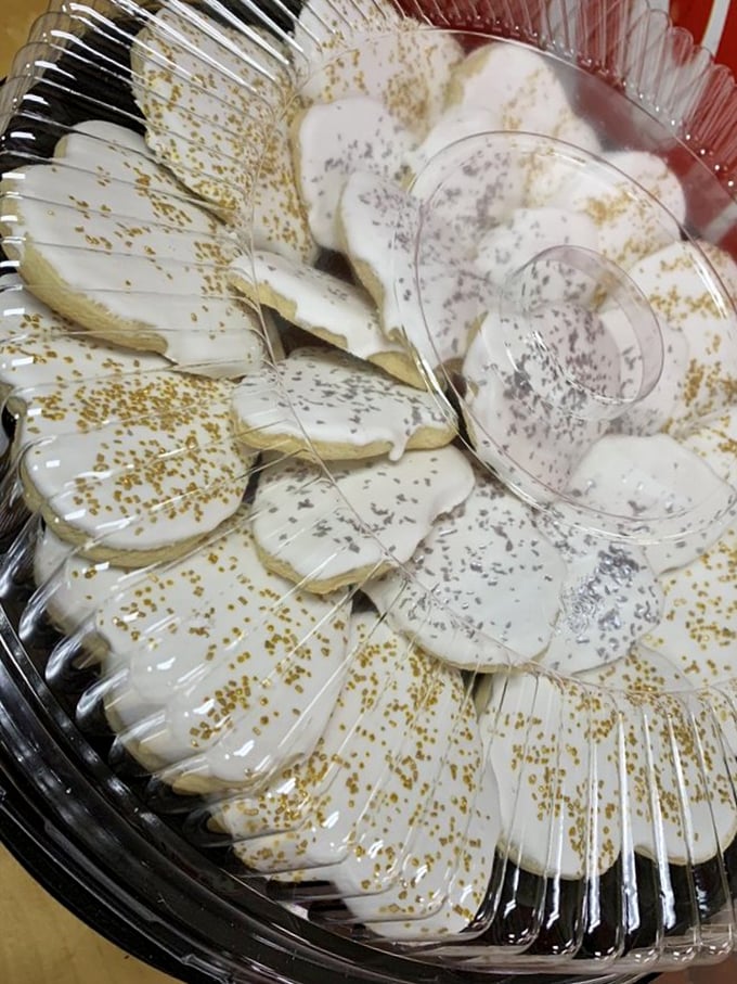 These butter cookies aren't just desserts—they're edible works of art with golden sprinkles that catch the light like tiny treasures.