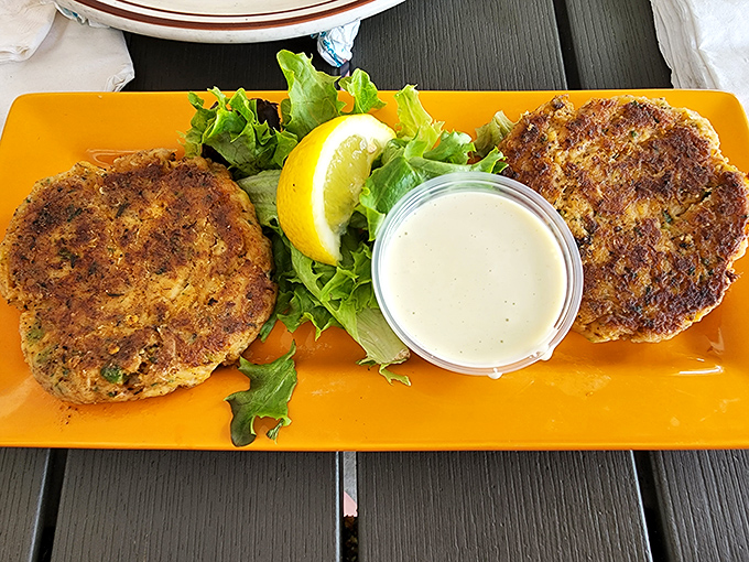 These crab cakes aren't just golden-brown, they're 24-karat treasures. More crab than cake, they're the reason napkins were invented.