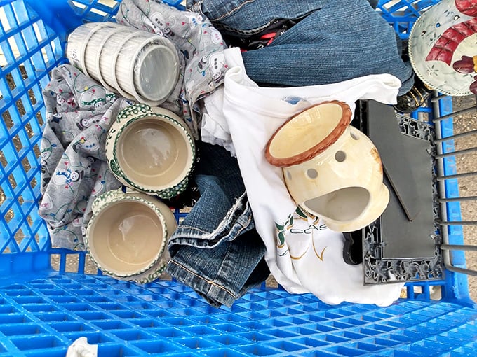 Treasure hunter's jackpot! Vintage ceramics nestled among denim and quirky decor – the thrill isn't just finding them, but imagining their stories.