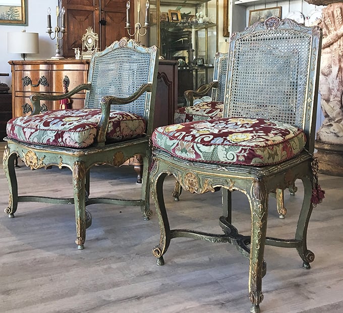 Mint-green French chairs that whisper tales of Versailles conversations—and they're sturdy enough for modern posteriors!