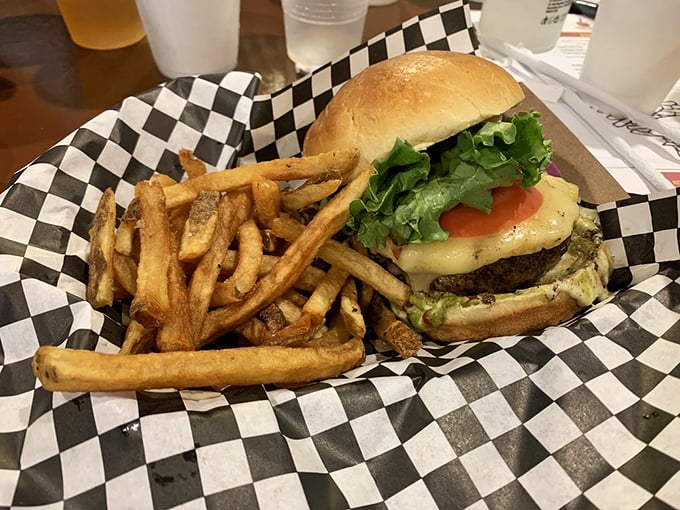 This isn't just a cheeseburger—it's edible architecture with perfectly stacked fresh ingredients that make your mouth water on sight.