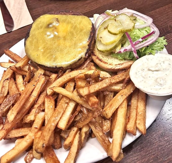 This isn't just a cheeseburger—it's a masterpiece of melty perfection with hand-cut fries that deserve their own fan club.