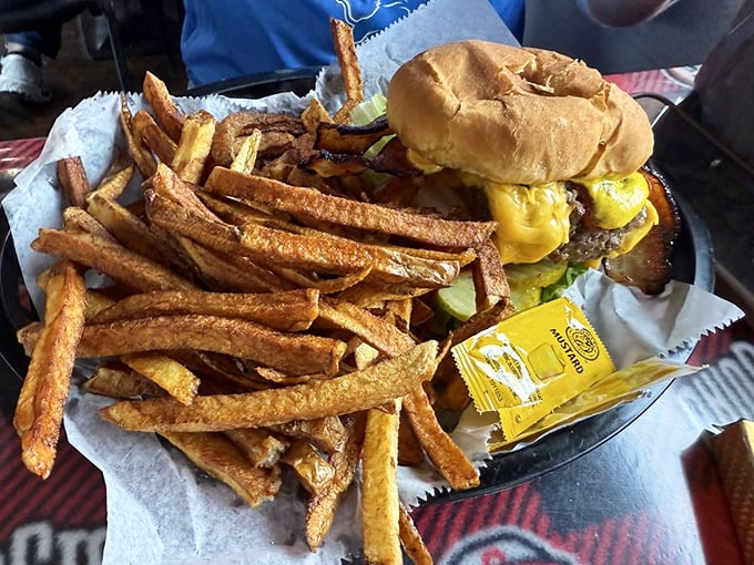 This isn't just a cheeseburger—it's a masterclass in American comfort food. Those hand-cut fries deserve their own zip code.