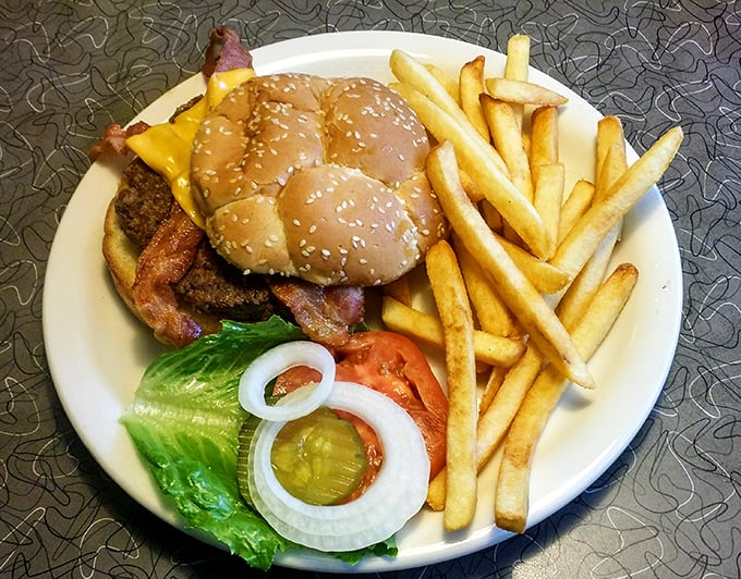 This isn't just a burger—it's architecture. The perfect stack of beef, cheese, and bacon that makes calorie-counting seem like buzzkill behavior.