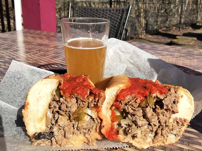 This isn't just a cheesesteak—it's edible architecture, where every bite delivers the perfect balance of meat, cheese, and those magical green peppers.