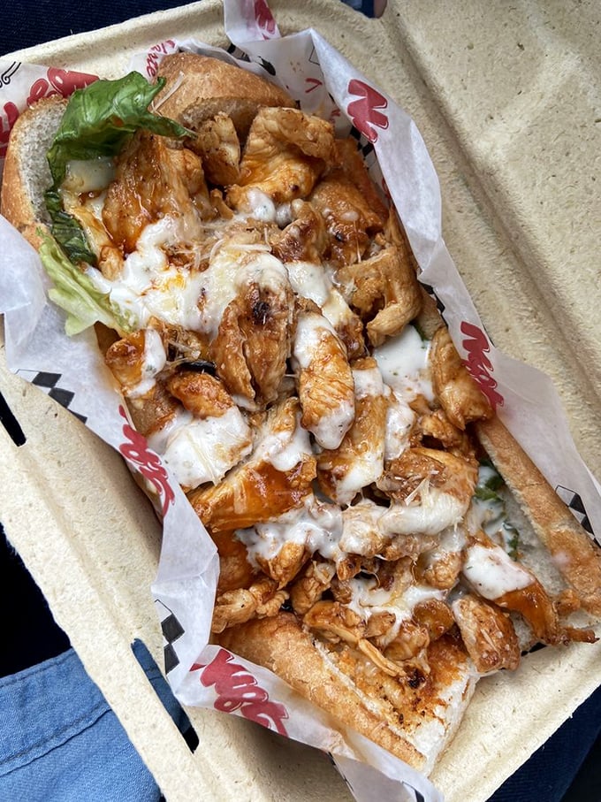 Behold the cheesesteak in its natural habitat—gloriously messy, perfectly melted, and worth every napkin you'll need afterward.