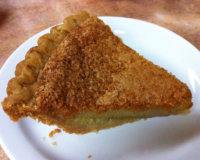 Golden-topped chess pie with that signature crackly crust—the sweet finale that's worth saving room for, even when you're stuffed.