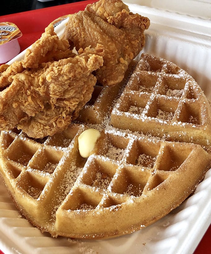The holy matrimony of crispy golden chicken and powdered sugar-dusted waffles—a relationship counselor couldn't design a more perfect pairing.
