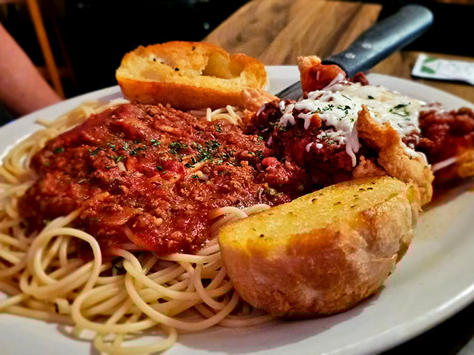 This isn’t just chicken parm; it’s a love letter to Italian-American comfort. Even the garlic bread would make any nonna weep with pride.