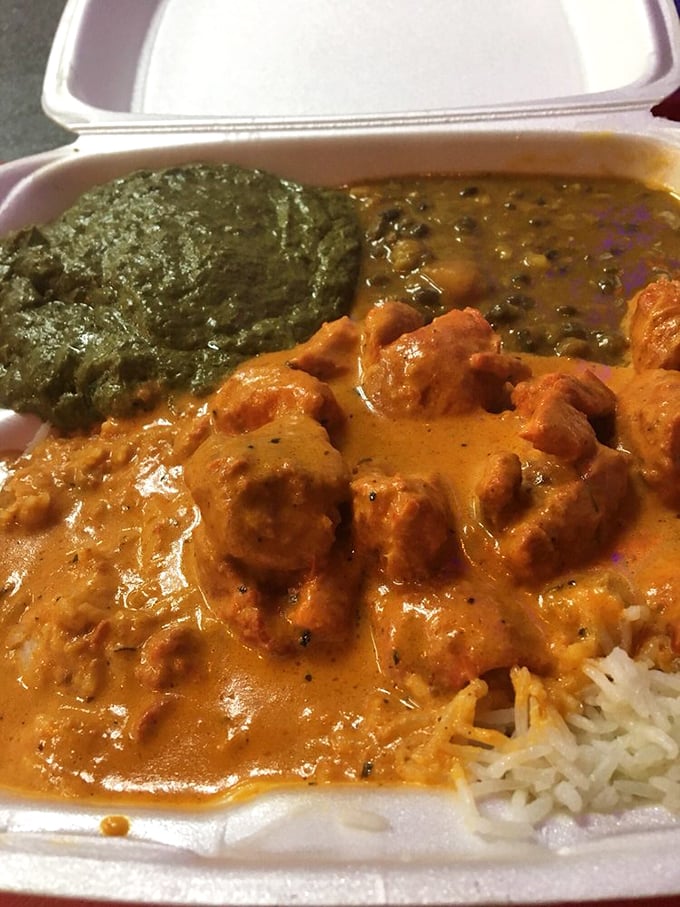 Chicken tikka masala that makes you want to lick the container clean—creamy, orange-hued magic with tender chunks of tandoori chicken.