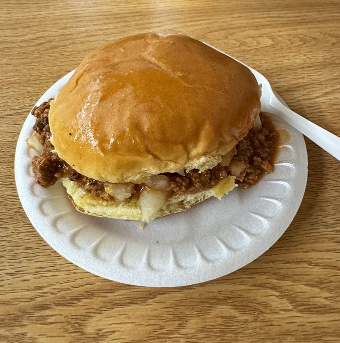 This isn't just a sandwich; it's a masterclass in comfort food engineering—a perfect ratio of meat to bun with chili that means business.