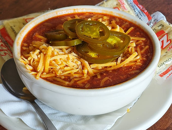Zip's Famous Chili arrives crowned with melted cheddar and jalapeños – a spicy halo that transforms an everyday bowl into something worth crossing town for.