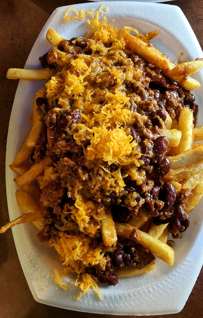 The legendary chili cheese fries—where crispy potatoes meet hearty chili and melty cheese in a relationship more perfect than any Hollywood romance.