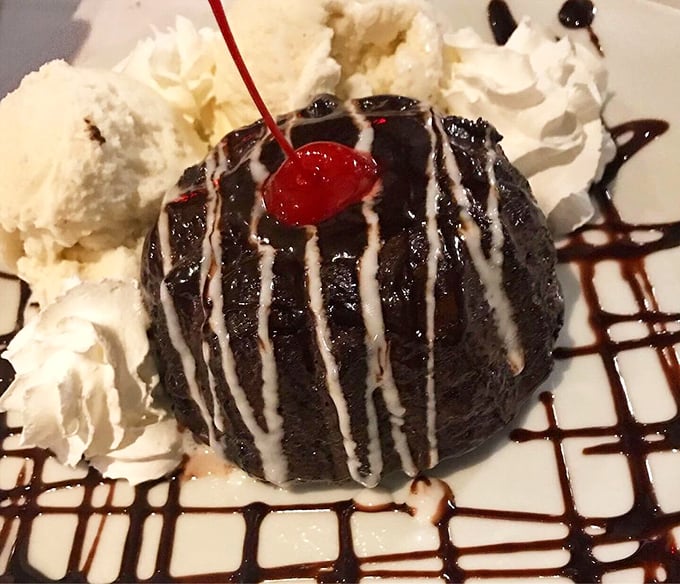 The chocolate lava cake doesn't just ooze—it performs a molten magic show on your plate. That cherry on top is basically taking a victory lap.