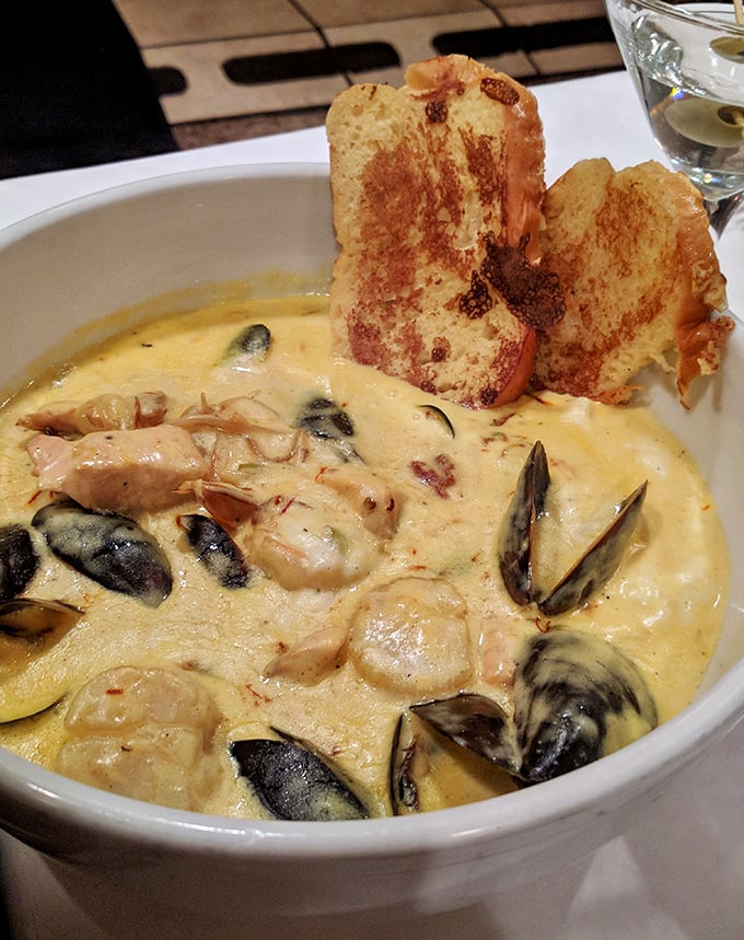 Behold the legendary sea chowder in all its glory—creamy, seafood-packed perfection that justifies the drive across Virginia.