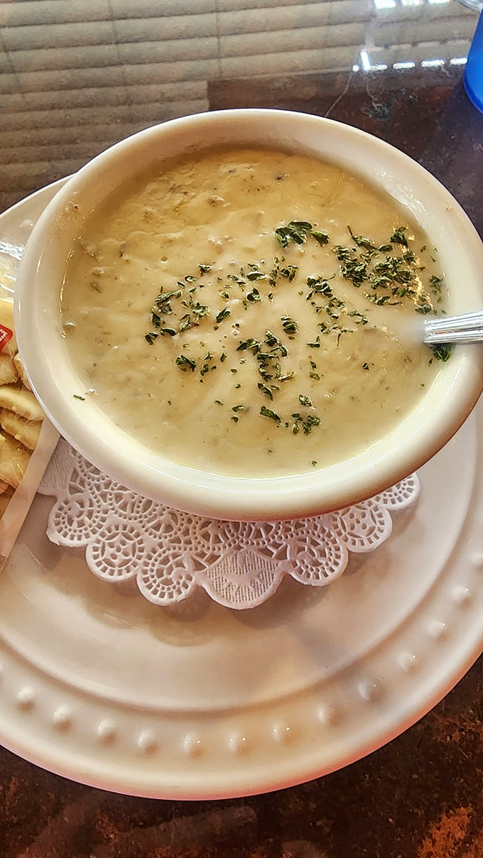 This isn't just clam chowder—it's a creamy bowl of coastal California in soup form, with herbs delicately sprinkled like confetti at a seafood celebration.