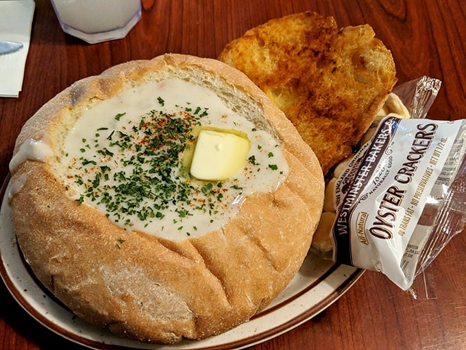 Behold the holy grail—chowder in a sourdough bread bowl with a pat of butter melting on top. Carb-counters, avert your eyes.