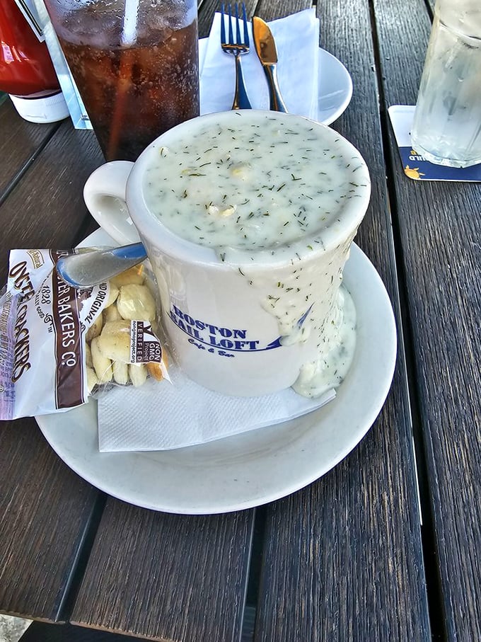 Behold the holy grail of chowder—creamy, herb-flecked perfection served in a mug that keeps it piping hot until the last heavenly spoonful.