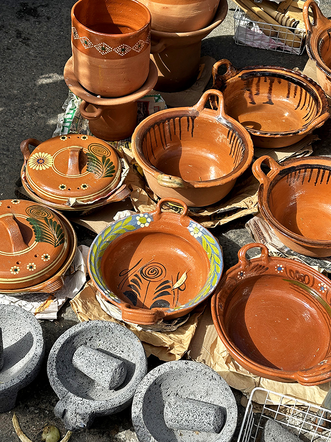 These handcrafted clay pots aren't just cookware—they're time machines to abuela's kitchen, each one promising to make your beans taste like childhood memories.