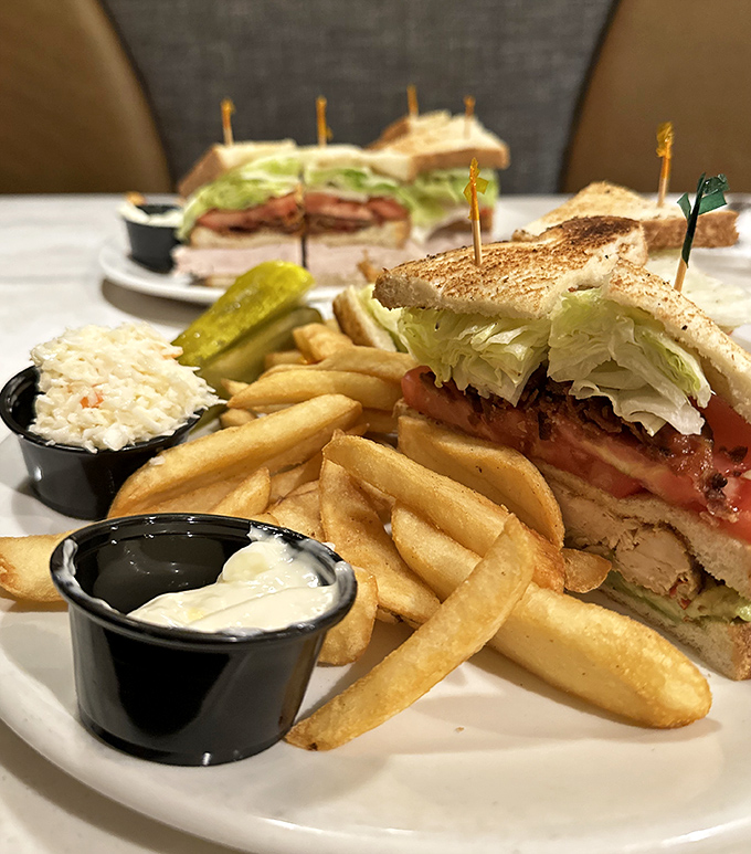 Architecture in sandwich form – this club doesn't just satisfy hunger, it redefines what three pieces of bread can accomplish when they dream big.