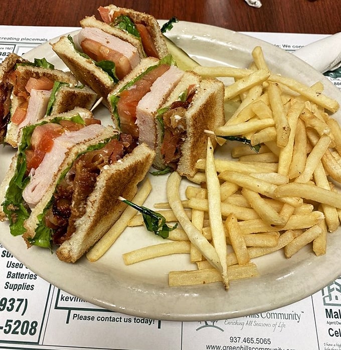 Club sandwiches are the jazz standards of American cuisine—when executed this perfectly, with crisp bacon and fresh vegetables, they're absolutely transcendent.