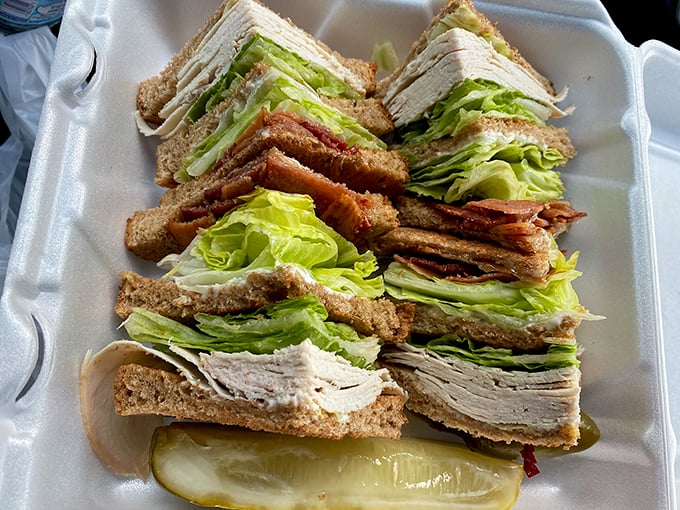 The club sandwich at Pann's doesn't just stack ingredients—it architects them into a skyscraper of satisfaction that requires both hands and zero shame.