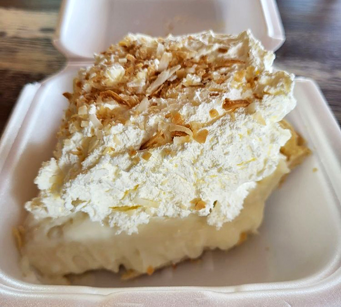 This coconut cream pie doesn't just satisfy a sweet tooth—it creates a lifelong addiction. Cloud-like whipped cream crowned with toasted coconut flakes is pure bliss.