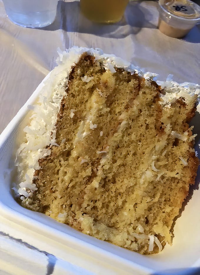 Layer upon heavenly layer of coconut perfection. This isn't just cake – it's the reason people drive miles out of their way.