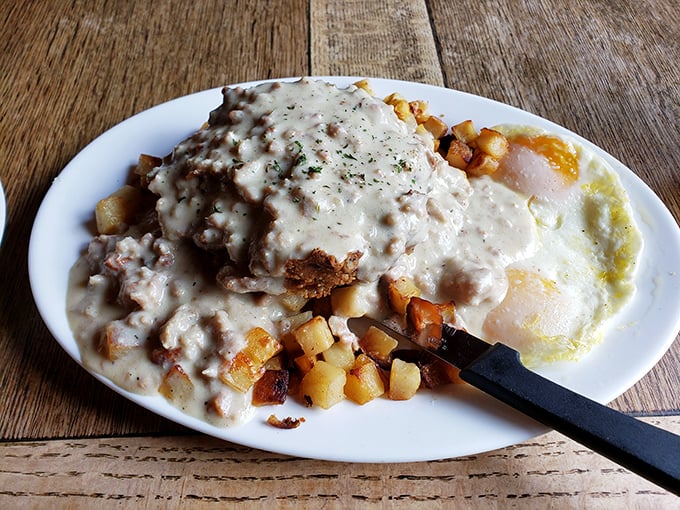 Food crime scene alert: Country fried steak smothered in pepper gravy with perfectly golden potatoes. Your diet called – it's taking the day off.