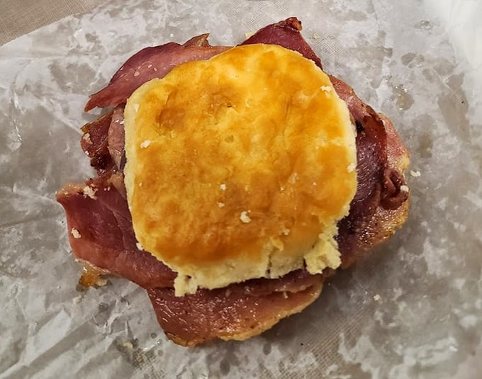 Behold the star attraction: a golden-brown biscuit embracing thin-sliced country ham – a simple masterpiece that's worth crossing county lines for.